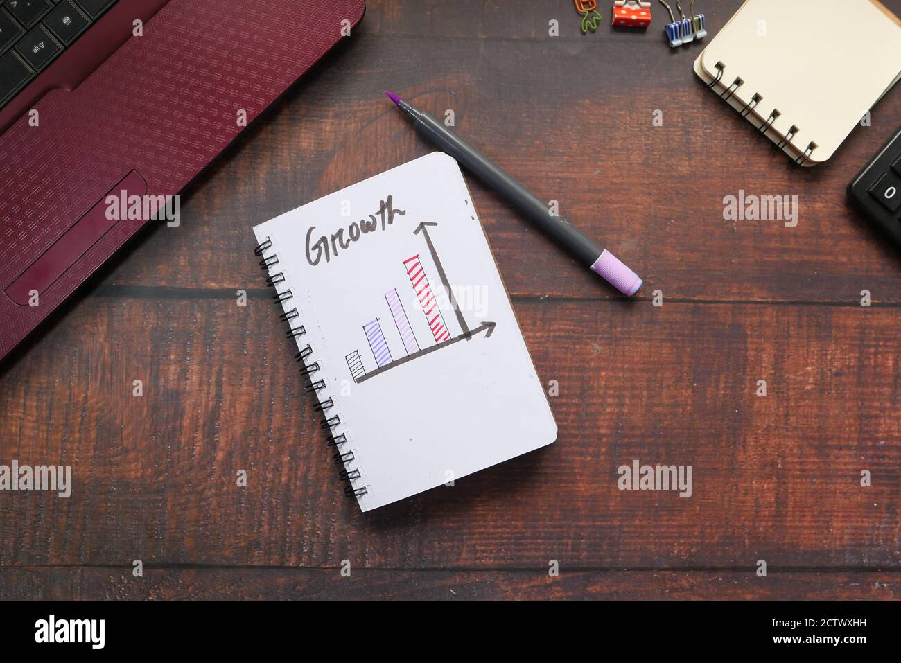 hand written growth chart on notepad at office desk Stock Photo - Alamy