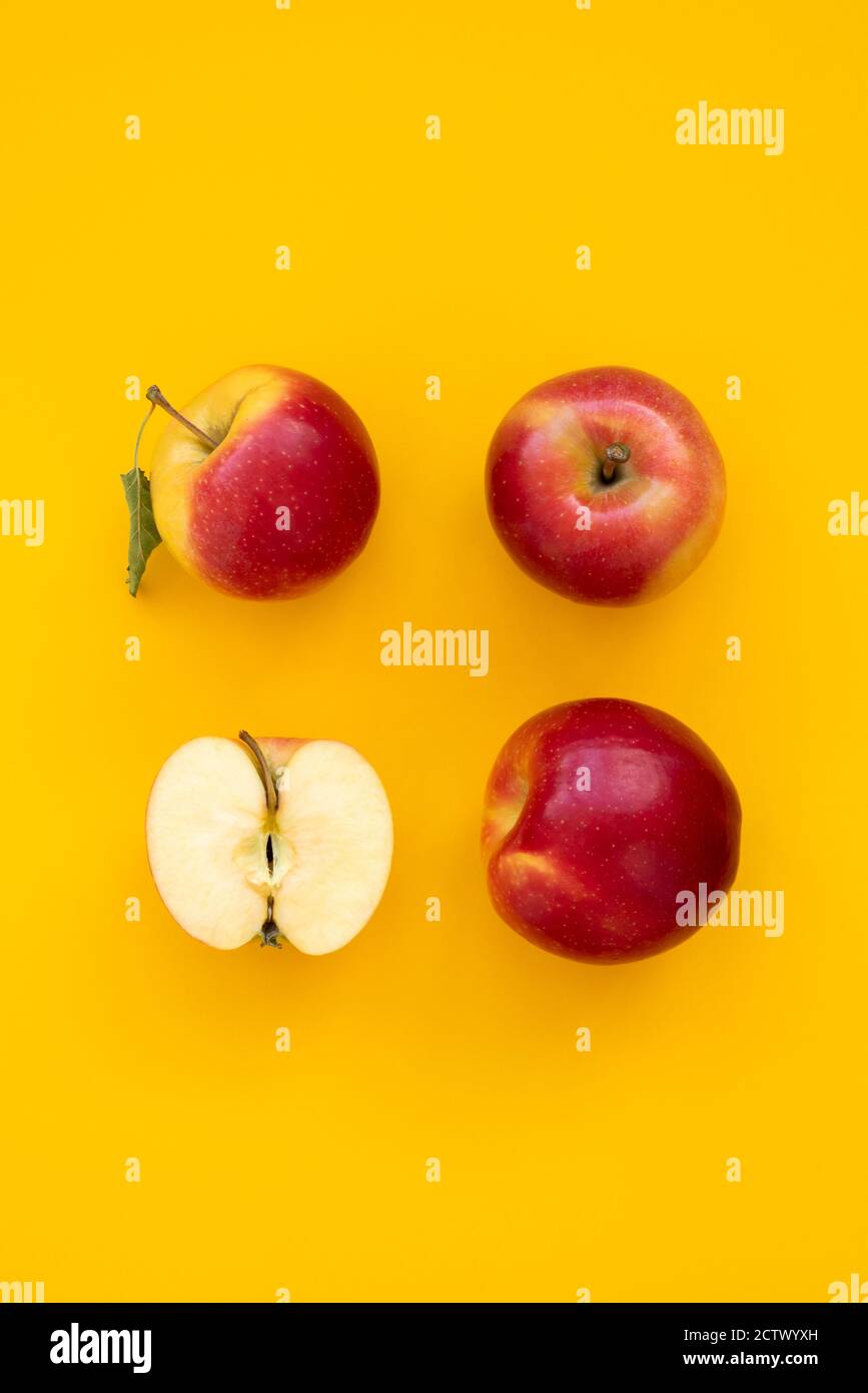 Fresh red Gala apples on yellow background. Top view. Flat lay Stock ...