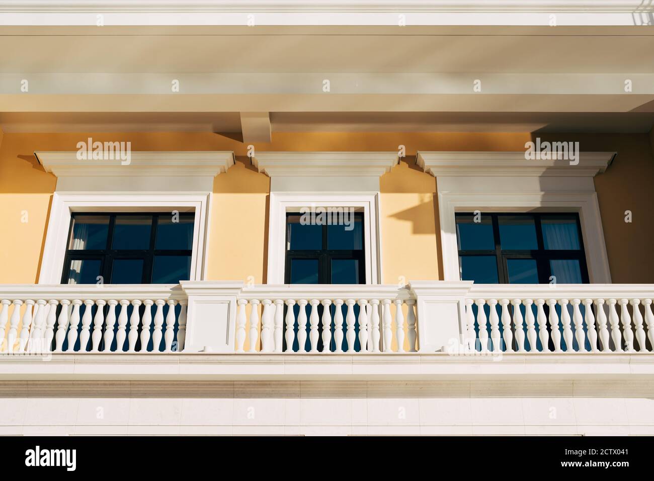 Access to the balcony and windows in a modern building with a pillar ...