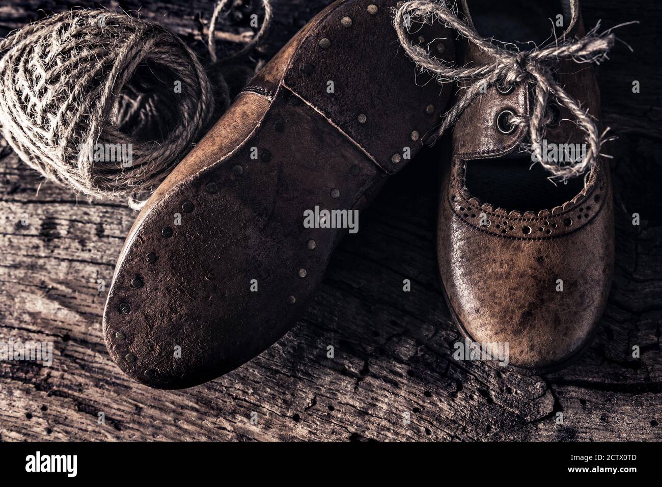 Antique leather shoes with riveted sole Stock Photo - Alamy