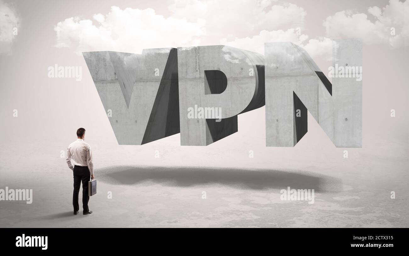 Rear view of a businessman standing in front of VPN abbreviation ...