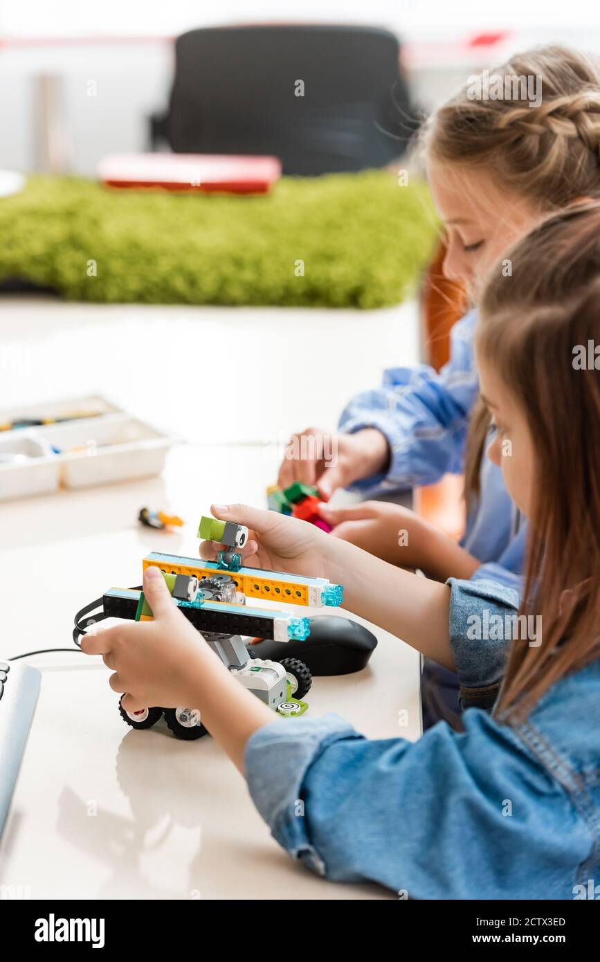 Kids playing with blocks in classroom hi-res stock photography and ...