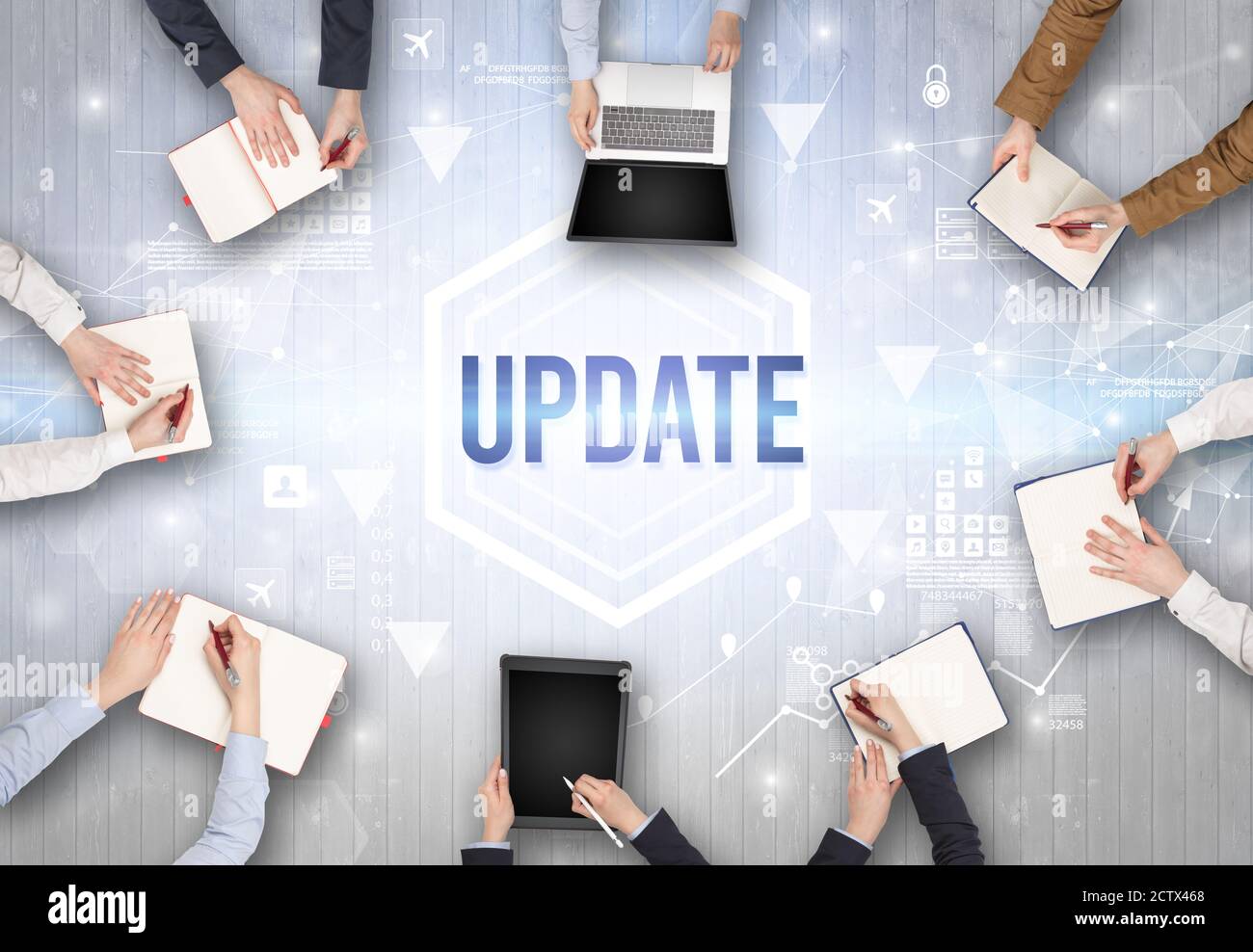 Group of Busy People Working in an Office with UPDATE inscription ...