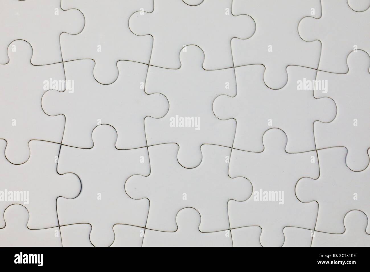 Connected puzzle pieces Stock Photo - Alamy