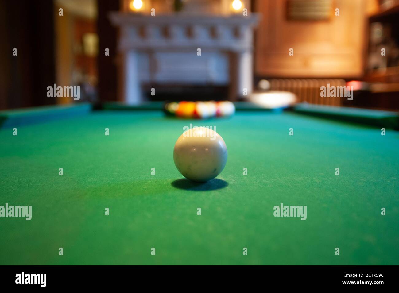 Pool balls set up on a pool table in a traditional Country House games ...