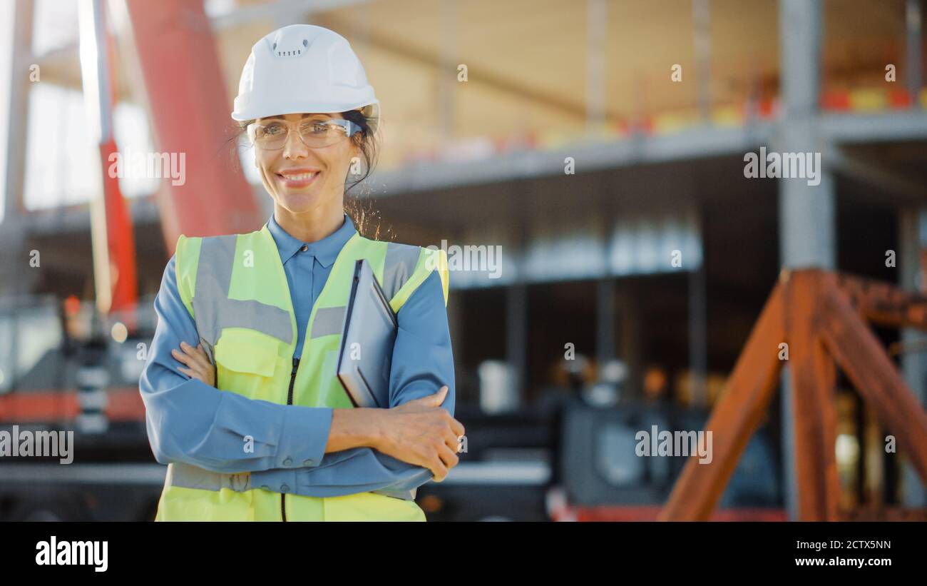 Portrait of Beautiful Female Architectural Engineer Safety Inspector ...