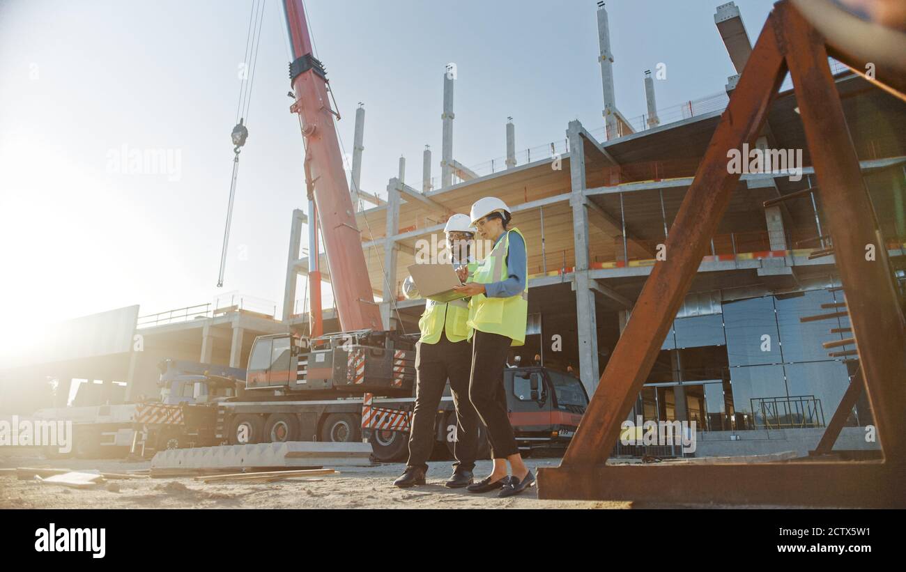 Two Specialists Inspect Commercial, Industrial Building Construction ...