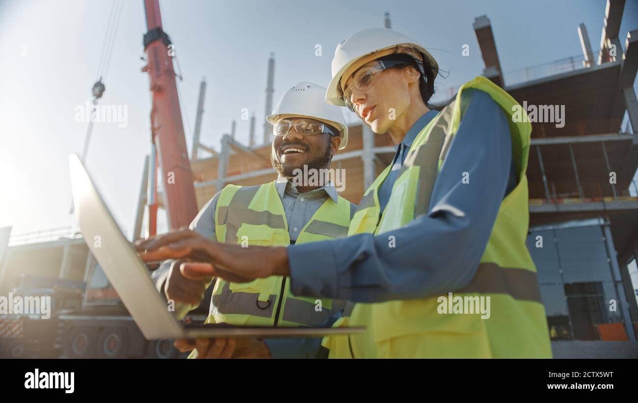 Two Specialists Inspect Commercial, Industrial Building Construction ...