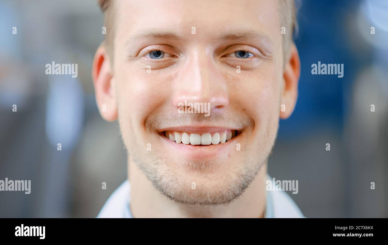 Close Up of a Handsome Young Blond Male Portrait Shot. He's a ...
