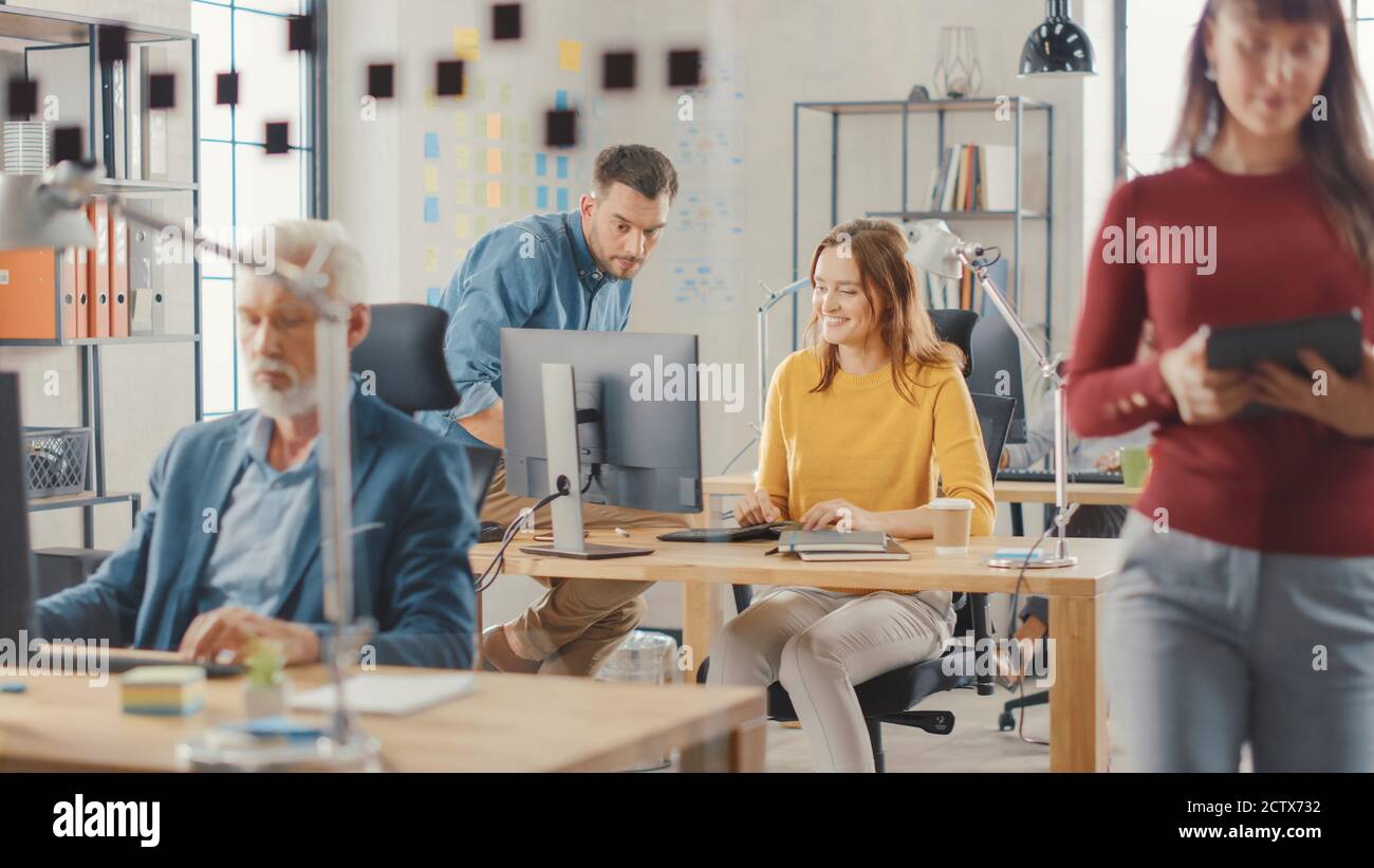 In the Busy Office: Group of Professional Businesspeople Working on ...
