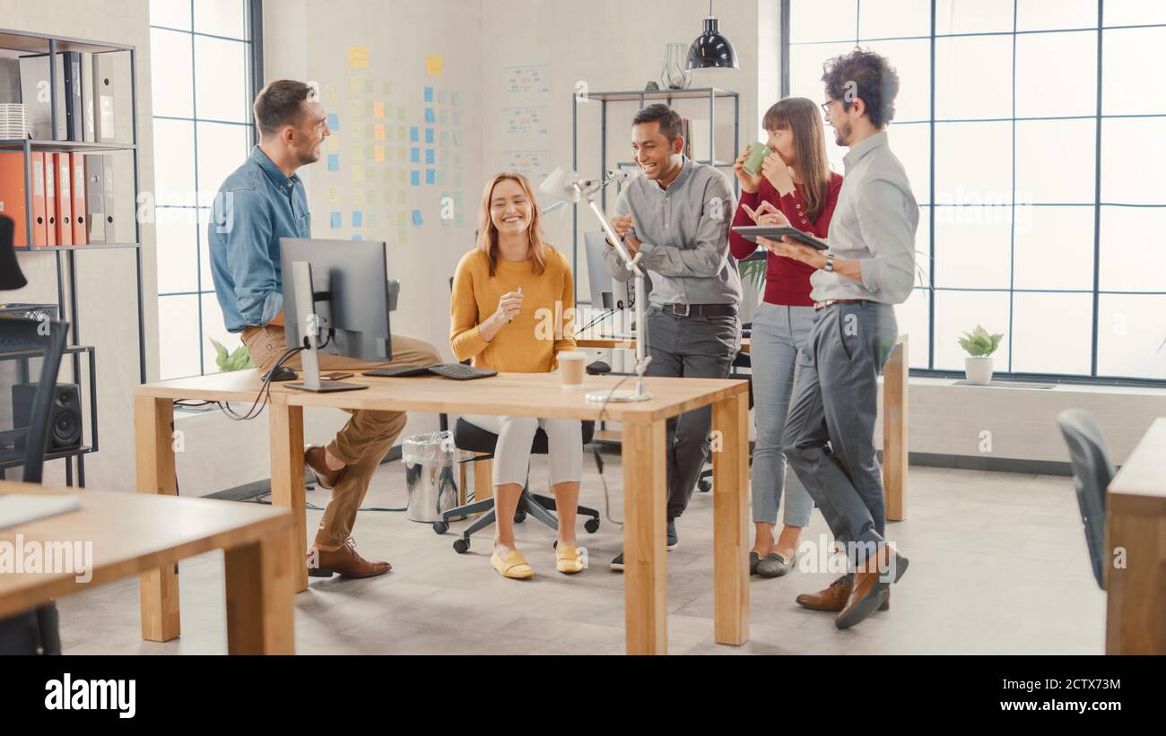 In the Modern Office: Diverse Group of Colleagues Have Meeting, Develop ...