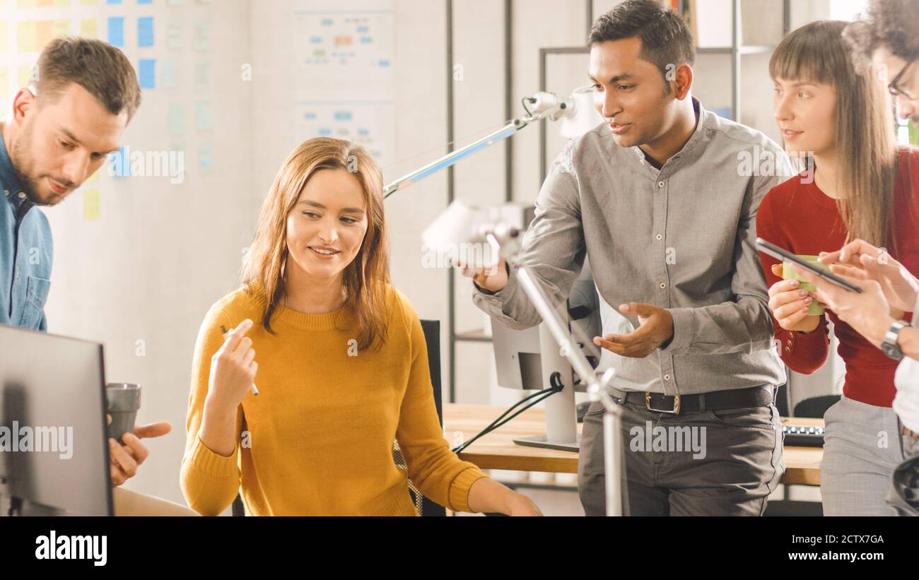 In the Modern Office: Diverse Group of Colleagues Have Meeting, Develop ...