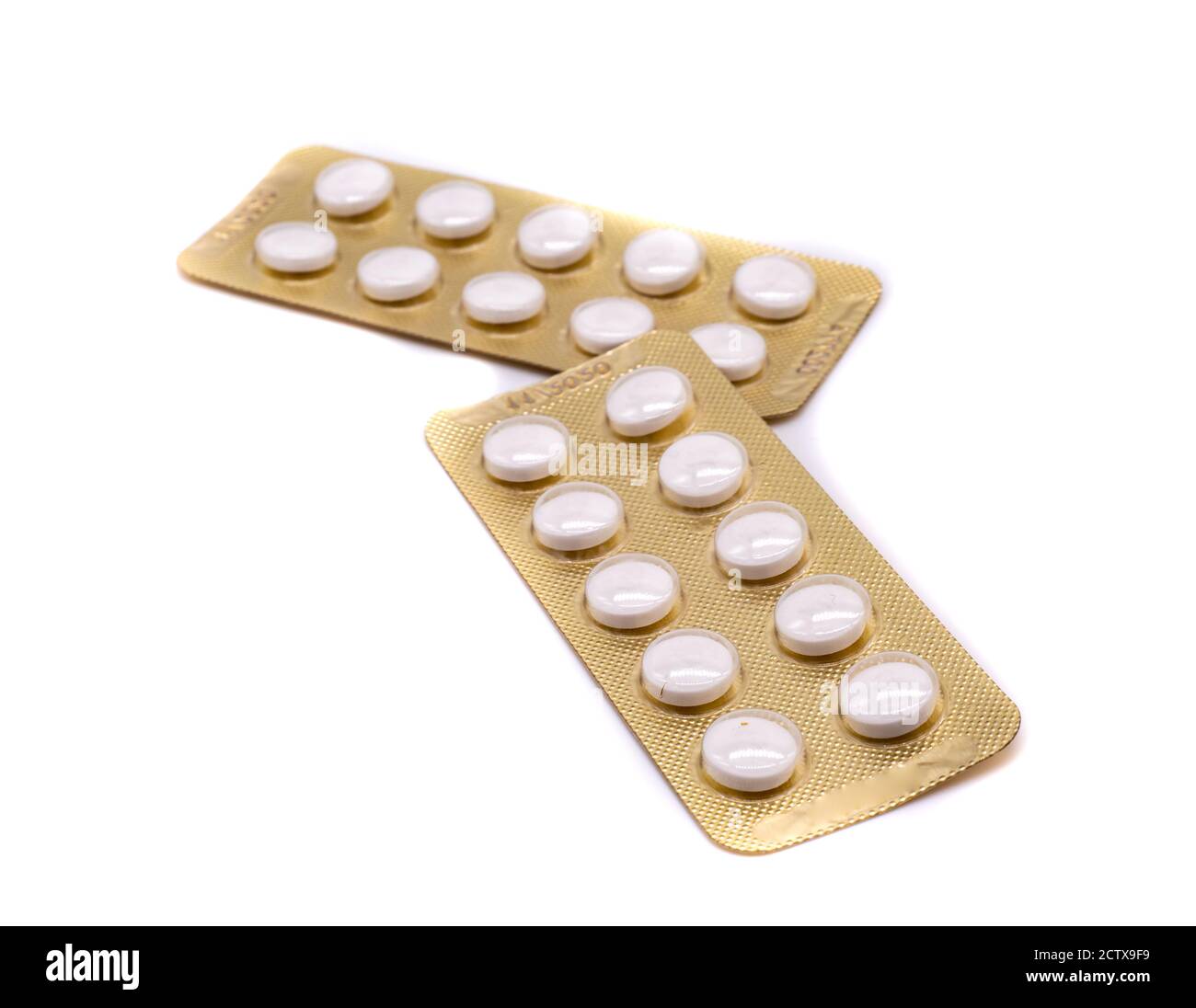 Tablets isolated on white background Stock Photo - Alamy
