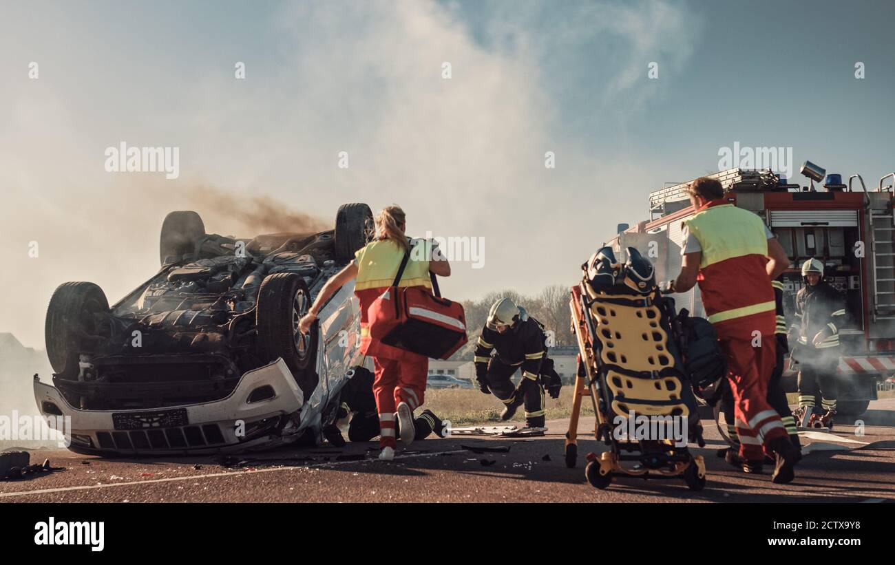 On the Car Crash Traffic Accident Scene: Paramedics and Firefighters ...