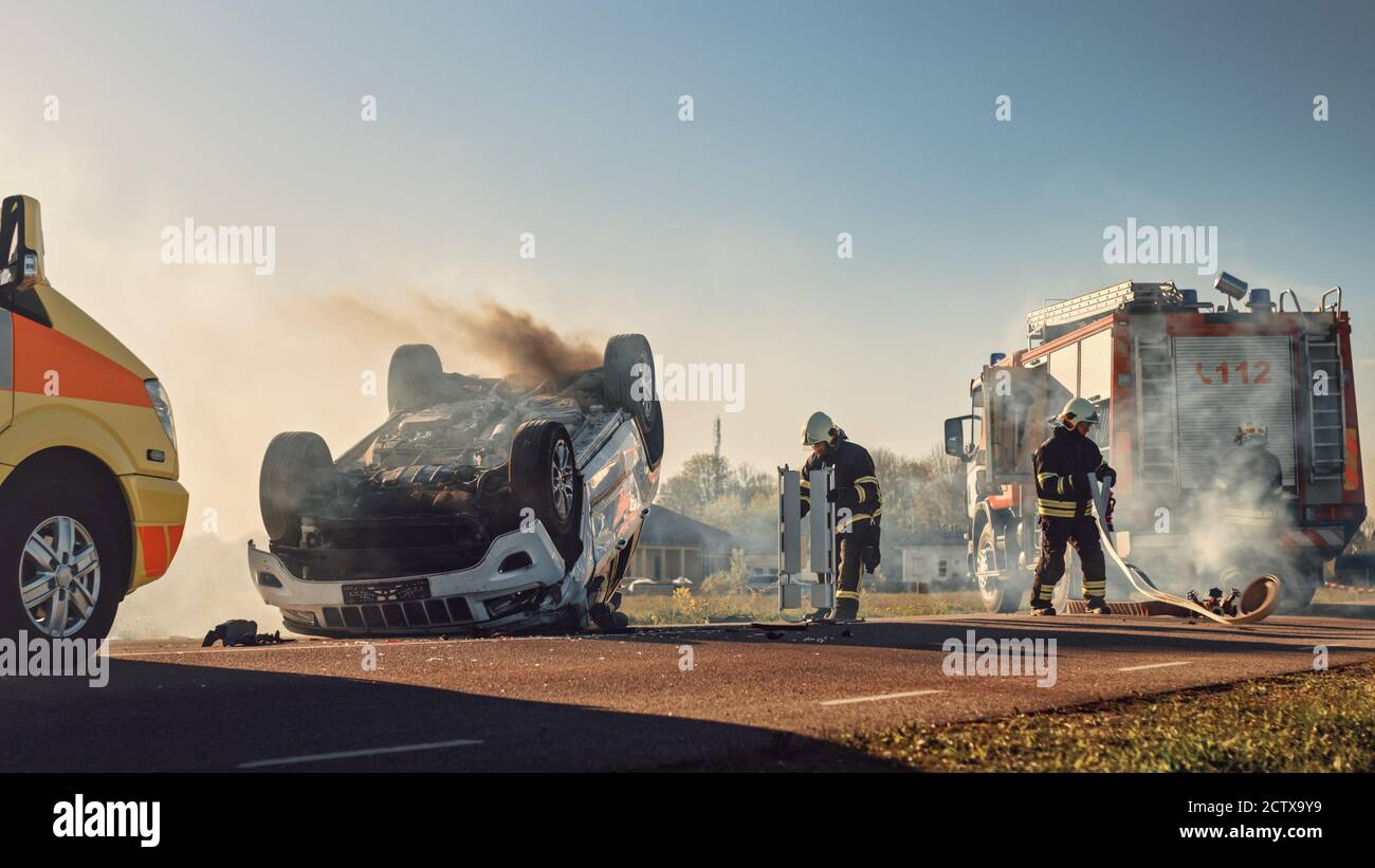 On the Car Crash Traffic Accident Scene: Paramedics and Firefighters ...