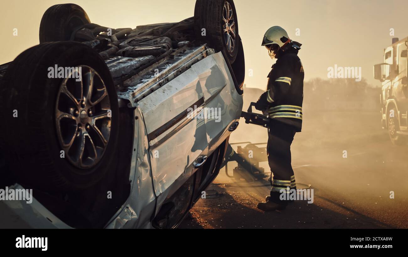 On the Car Crash Traffic Accident: Paramedics and Firefighters Rescue ...