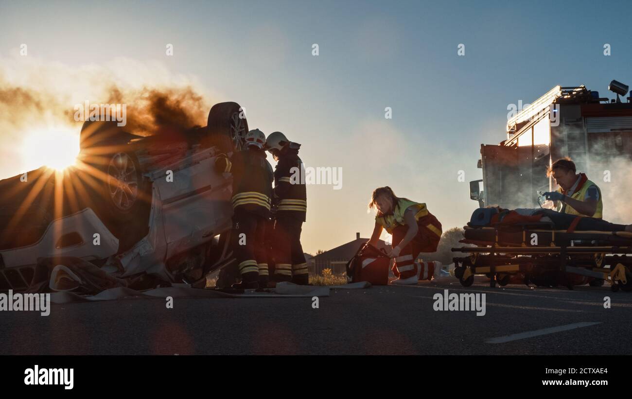 Car Crash Traffic Accident: Paramedics and Firefighters Rescue ...