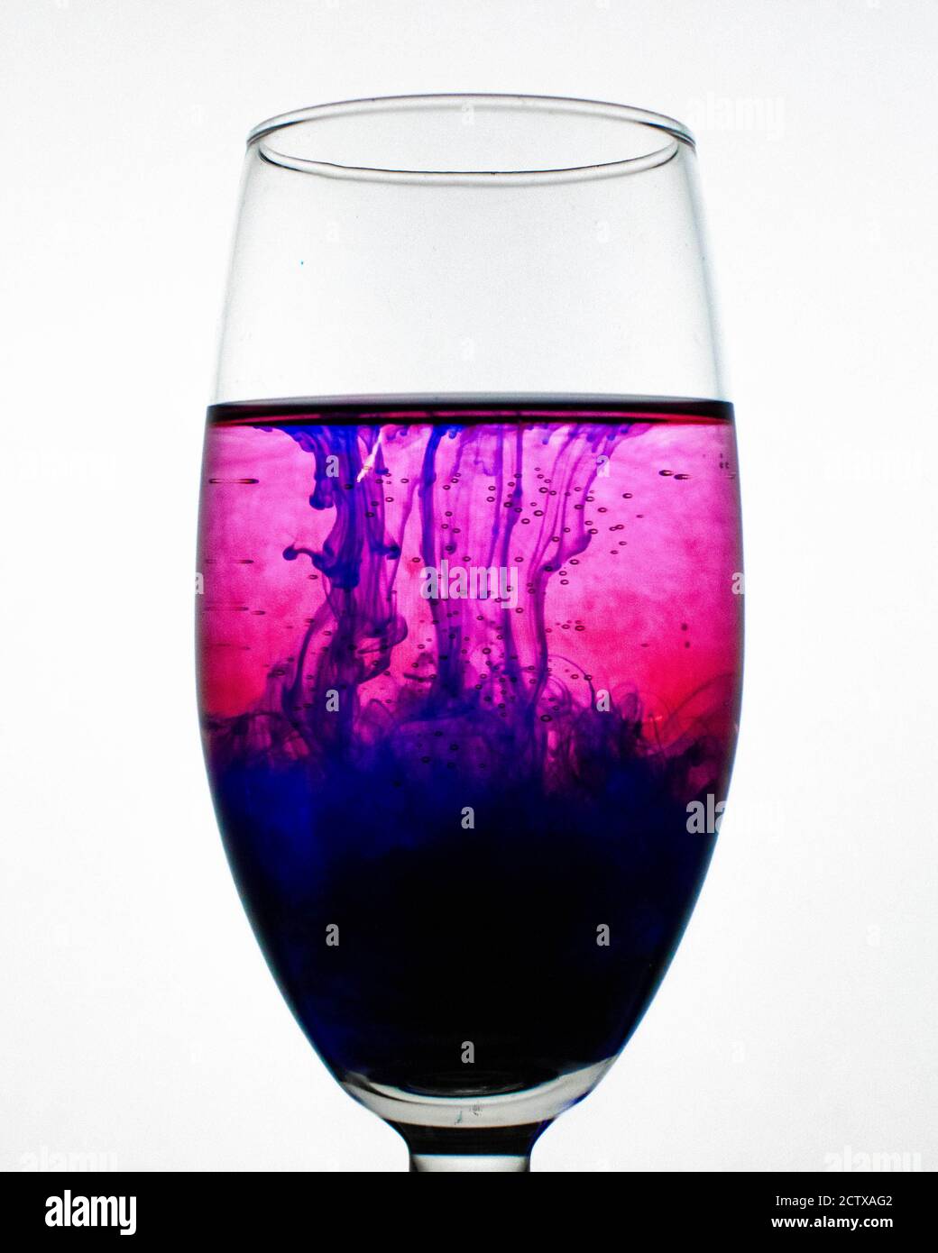 wallpaper of ink in glass Stock Photo - Alamy