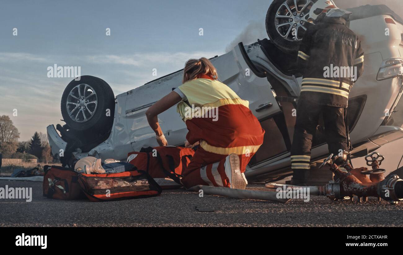 Car Crash Traffic Accident: Paramedics and Firefighters Rescue ...