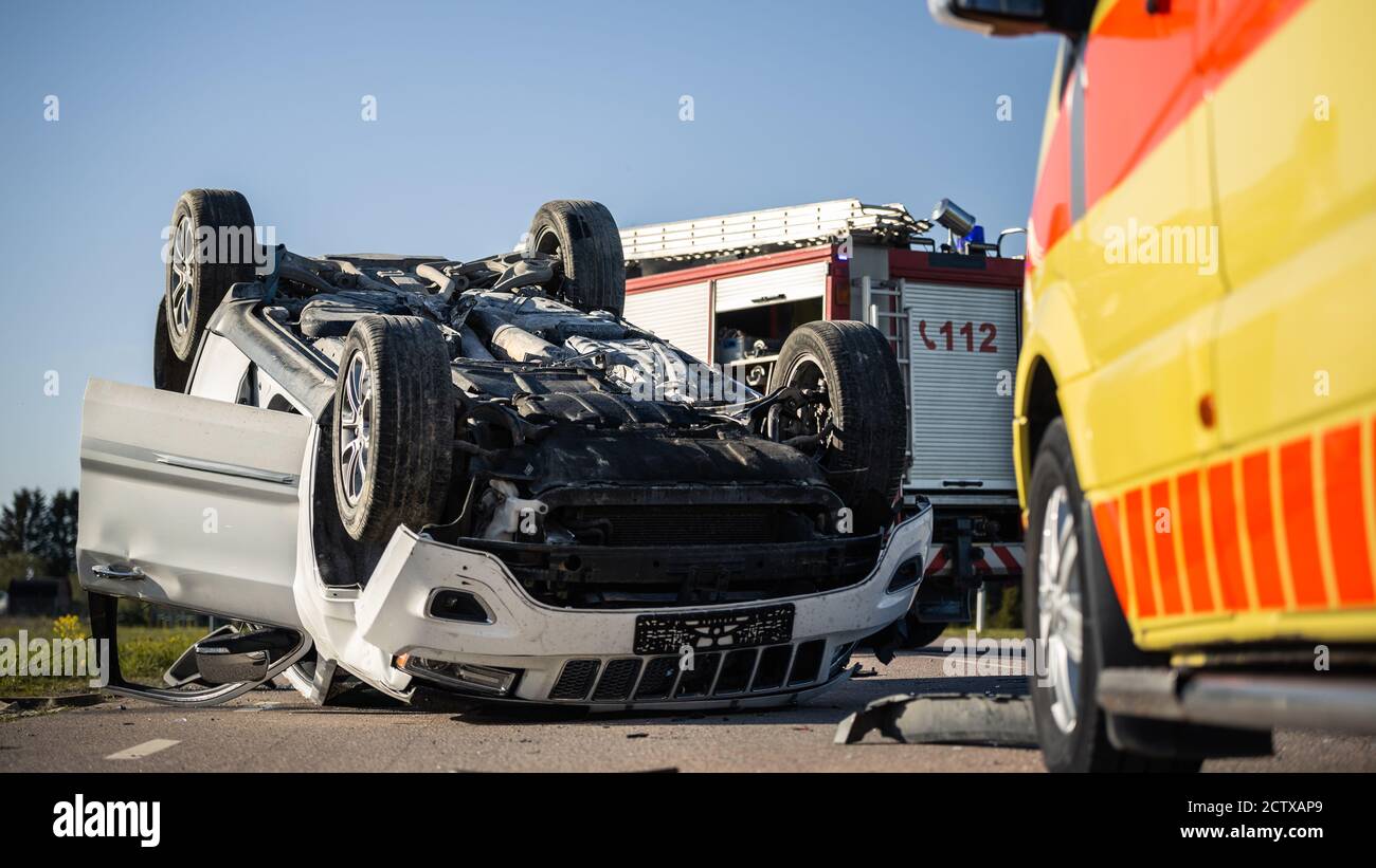 Shot of Rollovered Ca after Horrific Traffic Accident. Rescue Team of ...