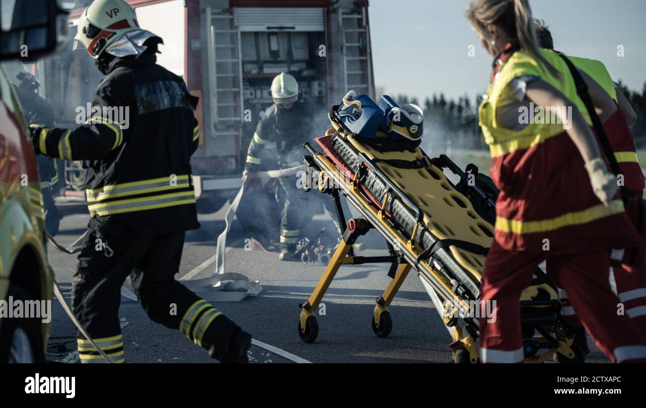 On the Car Crash Traffic Accident Scene: Paramedics and Firefighters ...