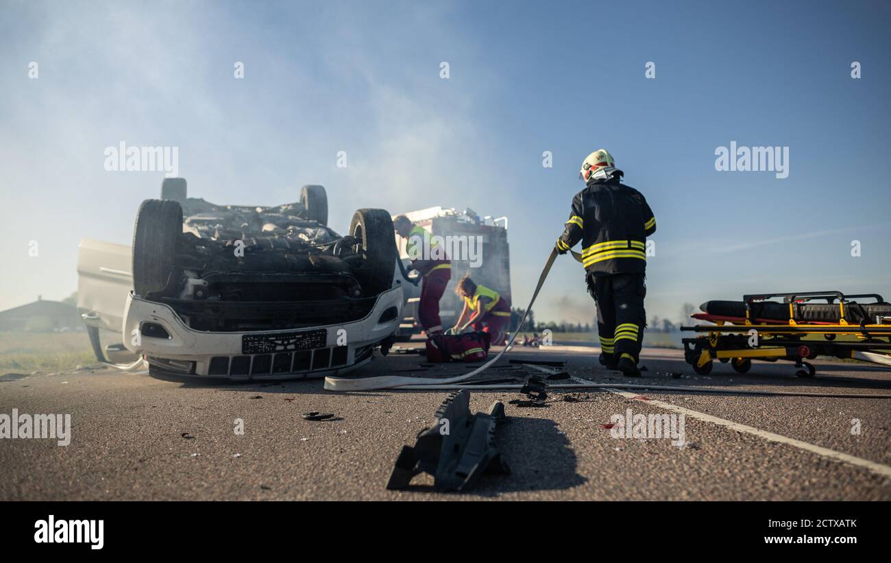 On the Car Crash Traffic Accident Scene: Paramedics and Firefighters ...
