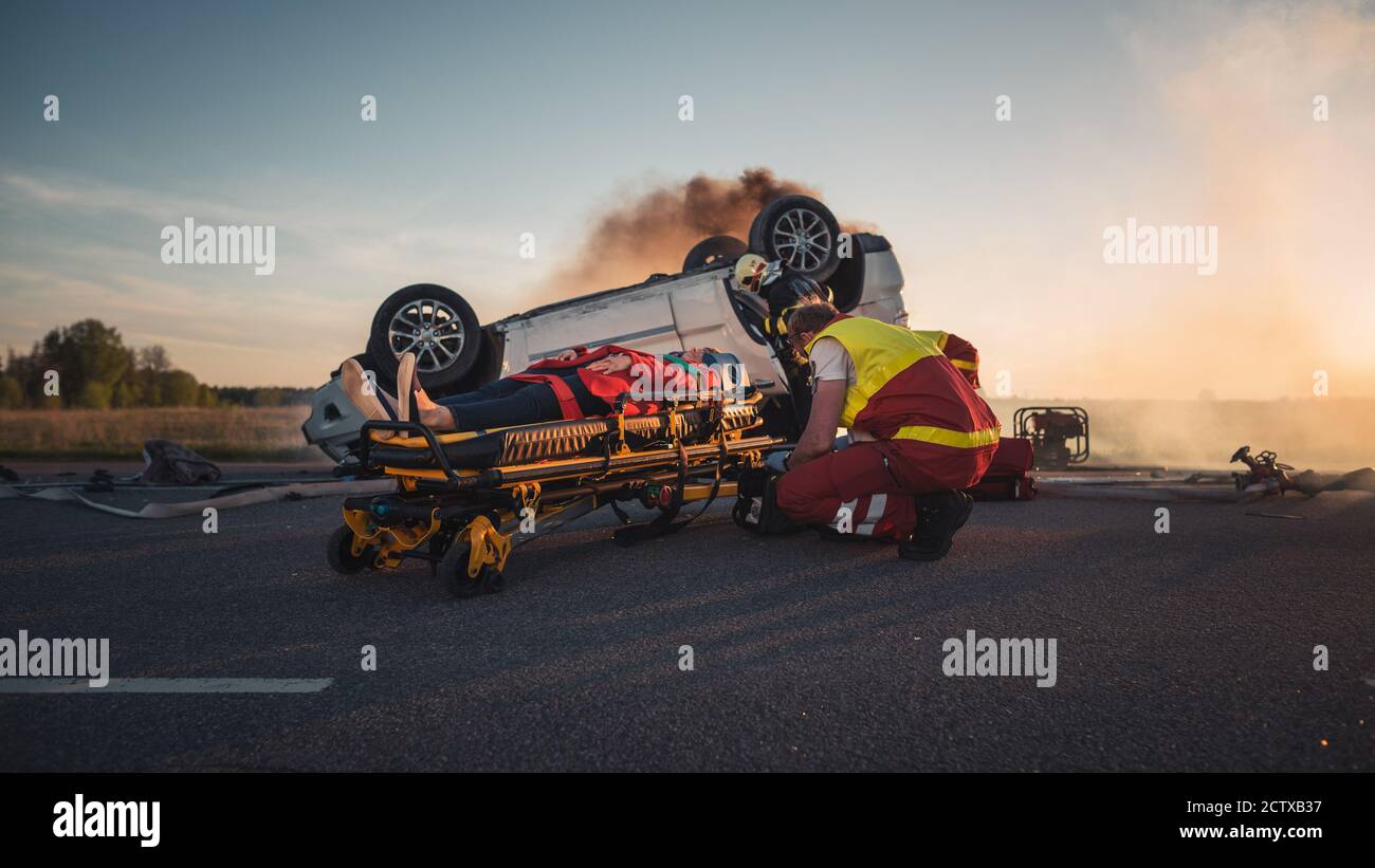 On the Car Crash Traffic Accident Scene: Paramedics Saving Life of a ...