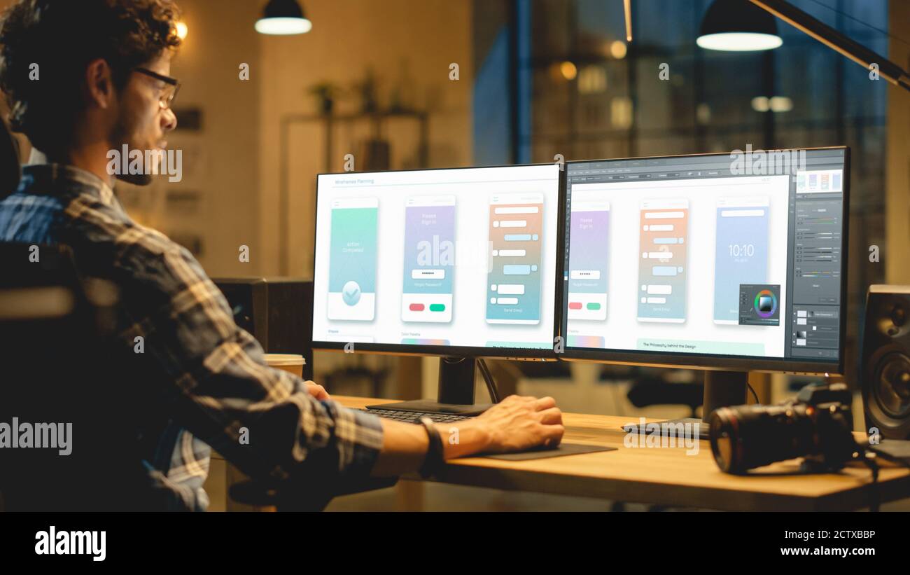 Late Evening Creative Office: Professional Programmer Works on a ... Late Evening Creative Office: Professional Programmer Works on a ...