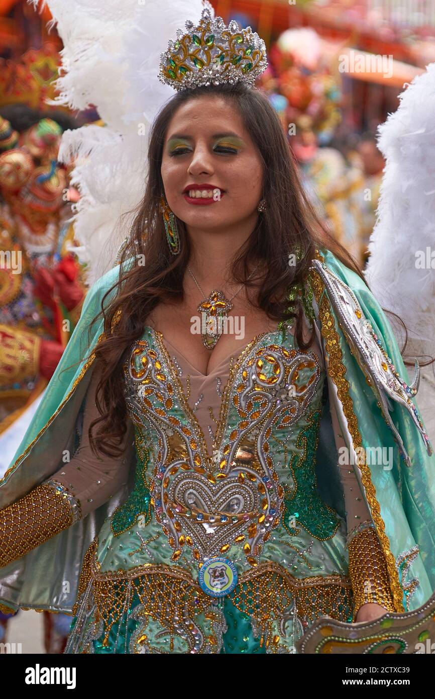 Diablada dancers in ornate costumes parade through the mining city of ...