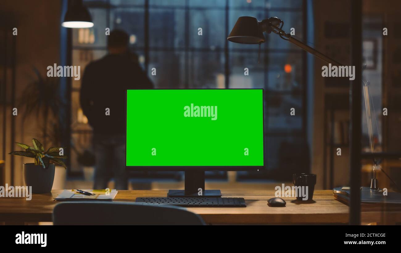 Desktop Computer with Mock-up Green Screen Standing on the Desk in the ...