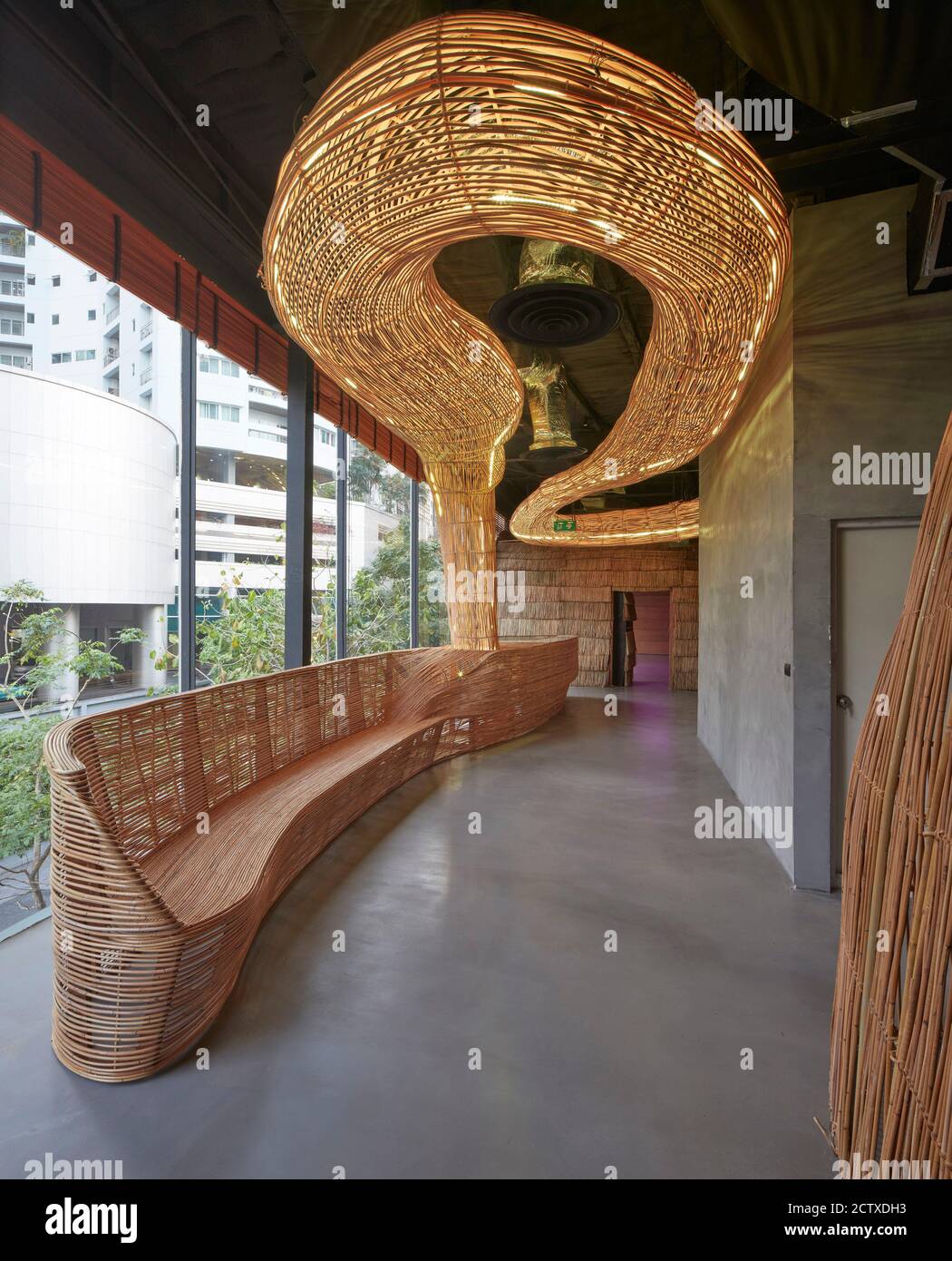 Reception area with sculptural rattan structures. Vikasa Yoga Centre ...