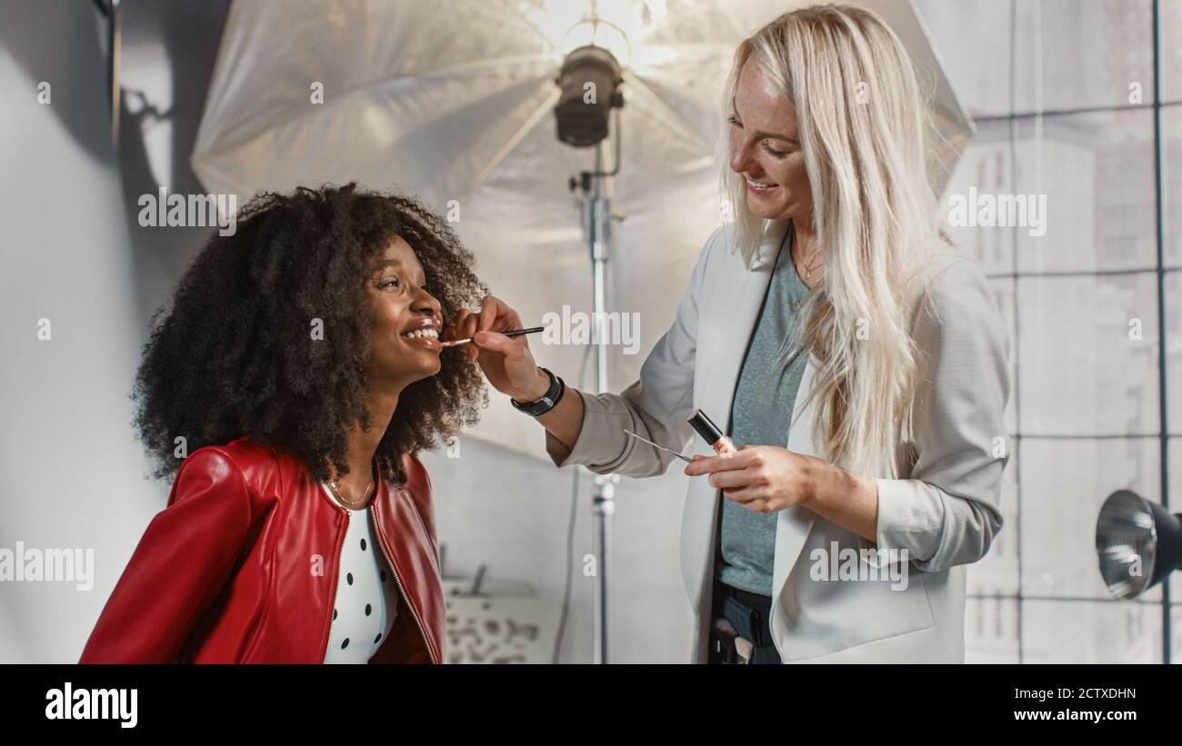 Backstage of the Photo Shoot: Make-up Artist Applies Makeup on ...