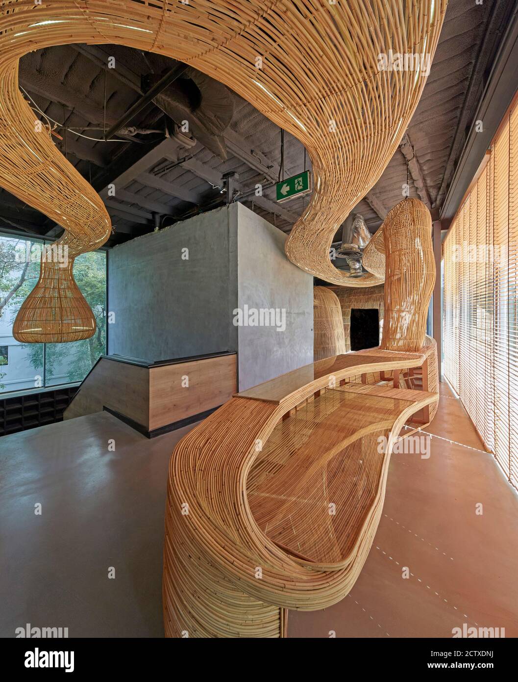 Reception area with sculptural rattan structures. Vikasa Yoga Centre ...