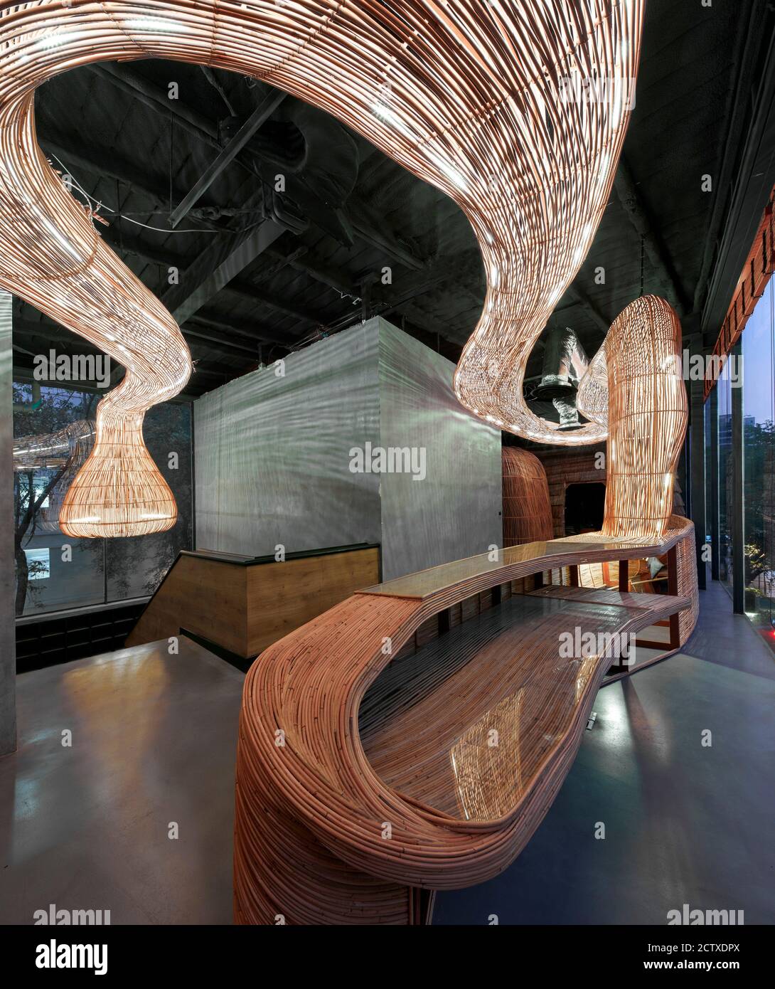 Reception area with sculptural rattan structures. Vikasa Yoga Centre ...