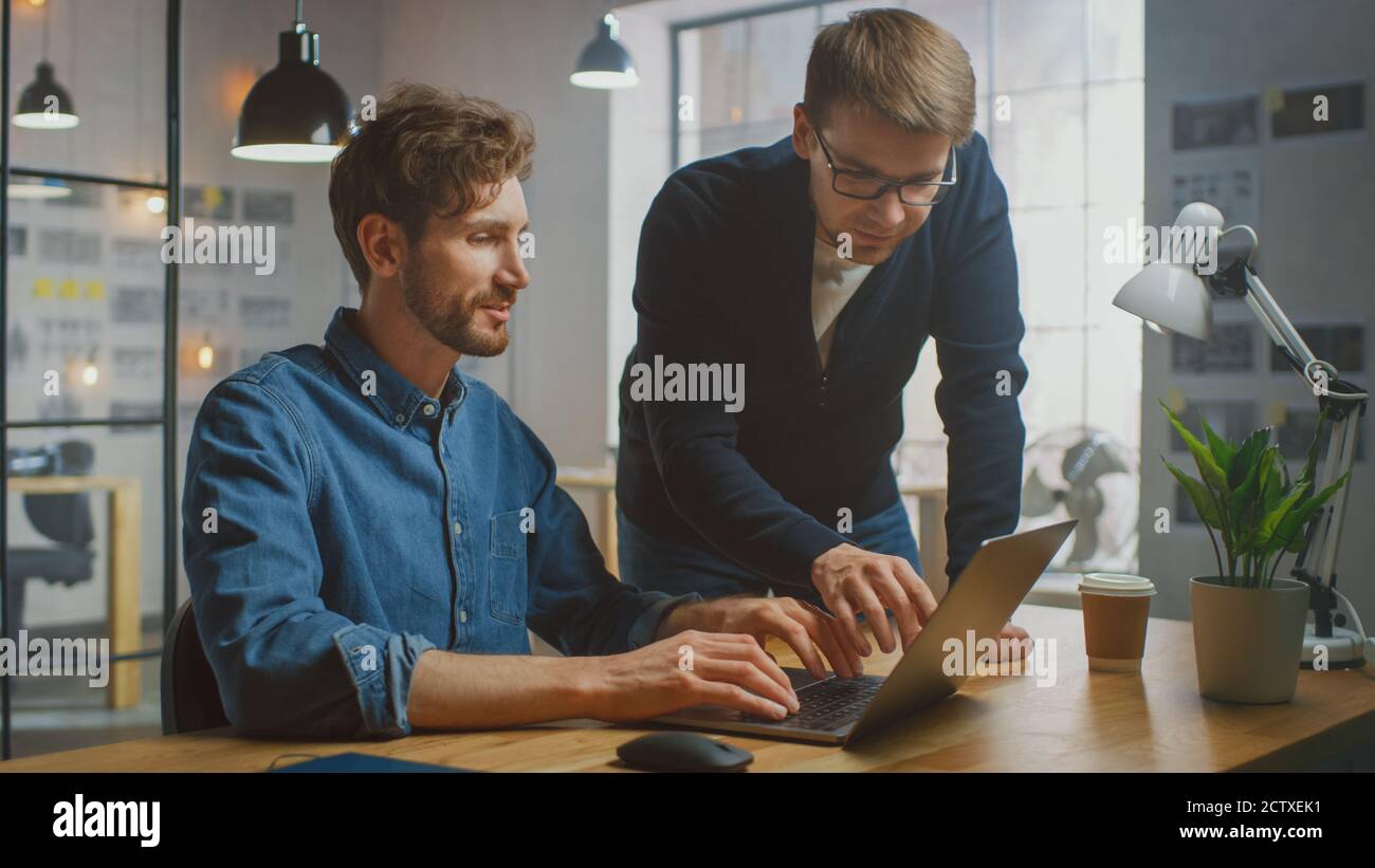 Two Handsome Creative Colleagues Talk about Worksand Discuss it on a ...