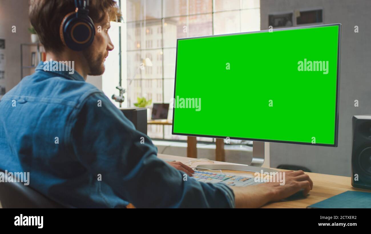 Young Professional Creative Employee Works on His Personal Computer ...