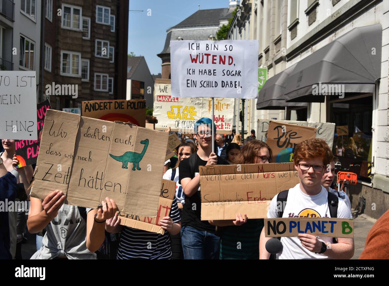 Participants with their posters at the Fridays for Future demonstration ...