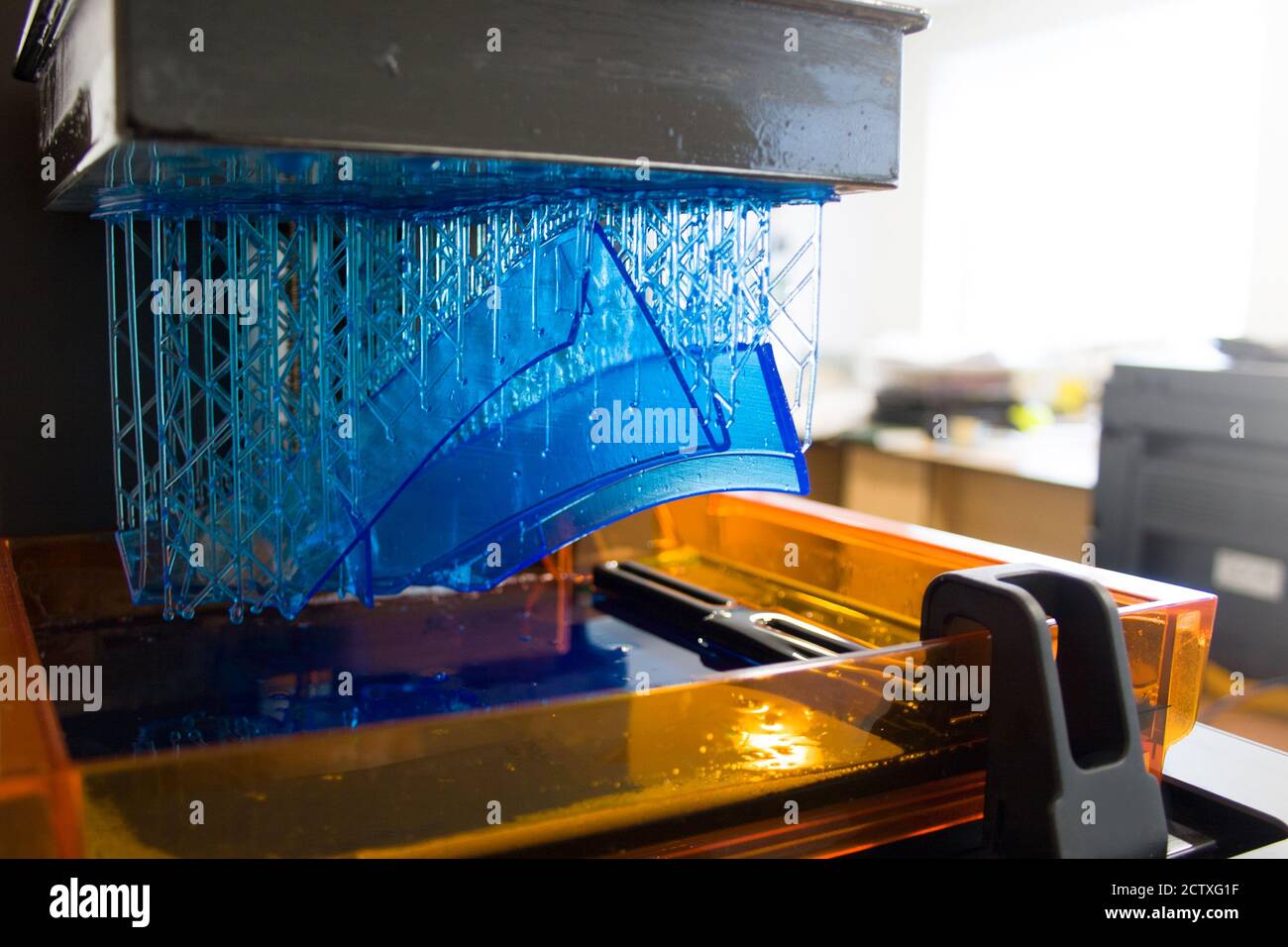 3D printing process. Modern 3D print technology. Working 3d printer machine printing a detail ...