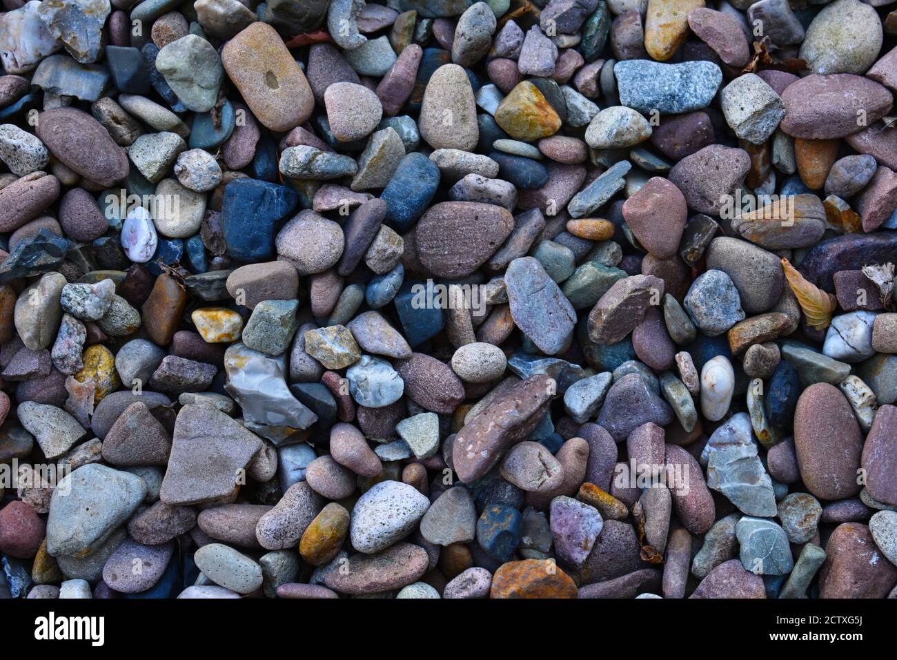 coloruful stones with different sizes making texture for the background ...