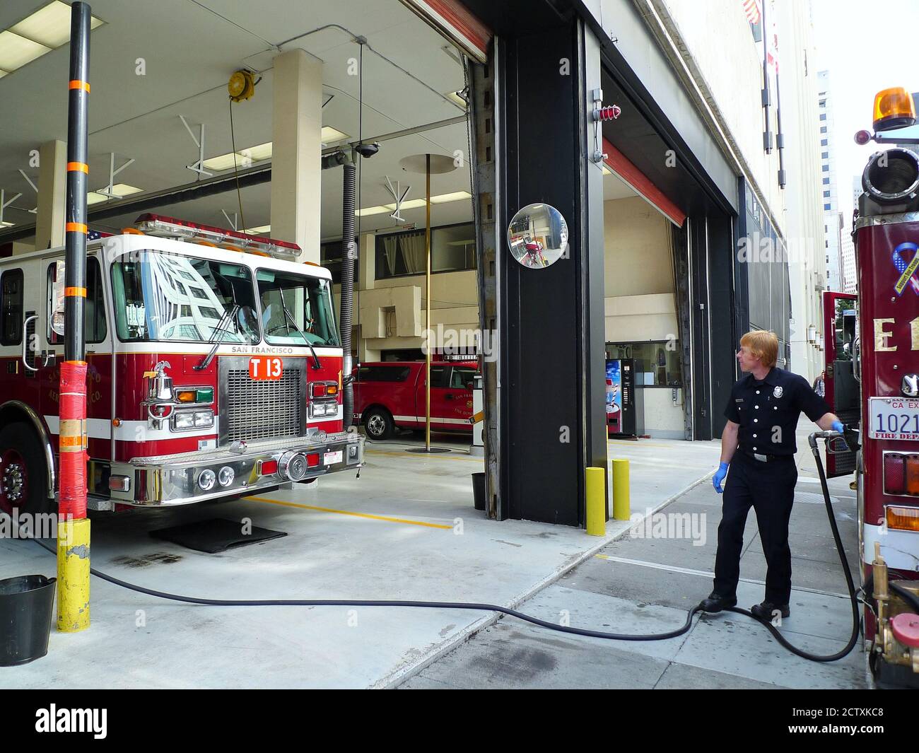 PEOPLE INSIDE A FIRE STATION Stock Photo - Alamy