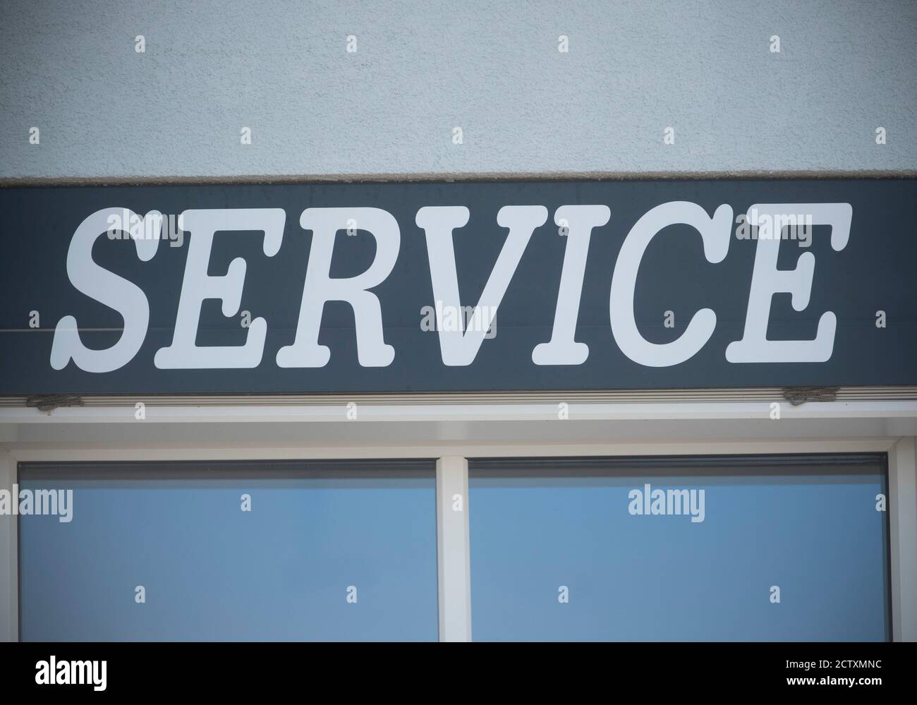 service sign on a wall, public service office in administration Stock ...