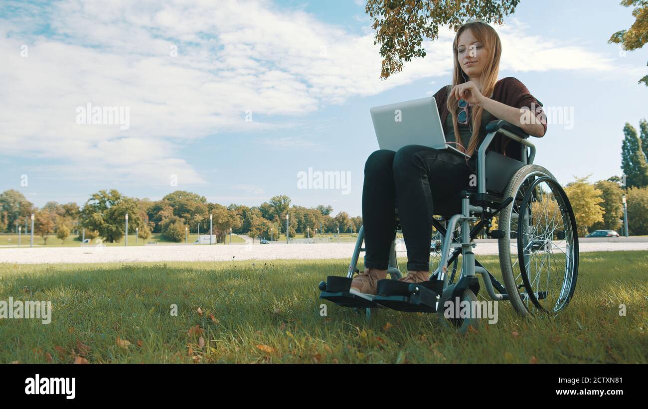 Remote work concept. Young beautiful disabled caucasian woman in ...
