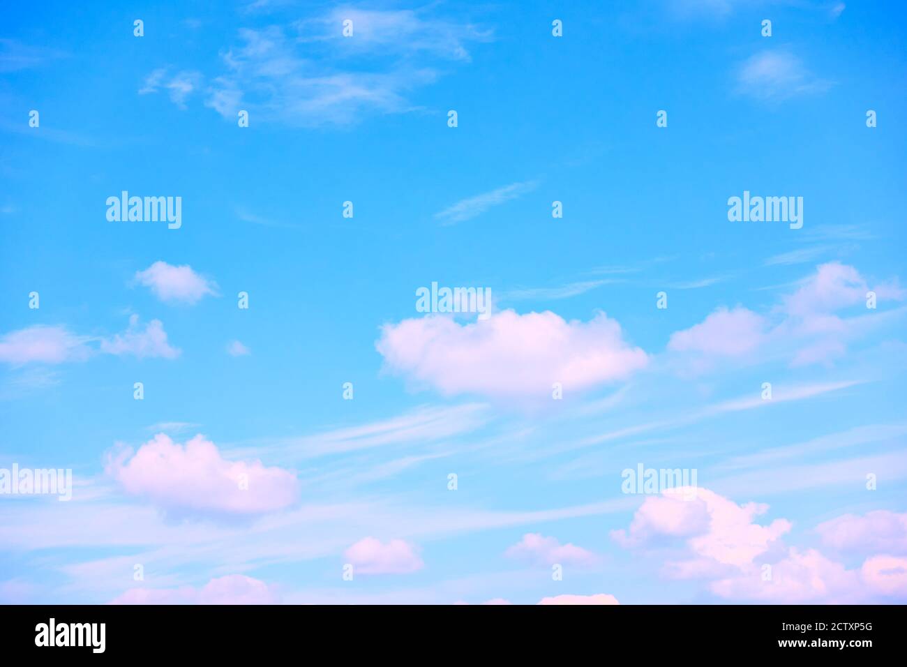 Light blue sky with white clouds, may be used as background. Cloudscape ...