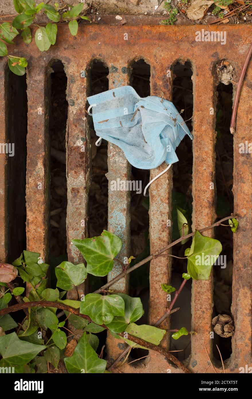 Waste during COVID-19. Discarded to single-use coronavirus face masks ...