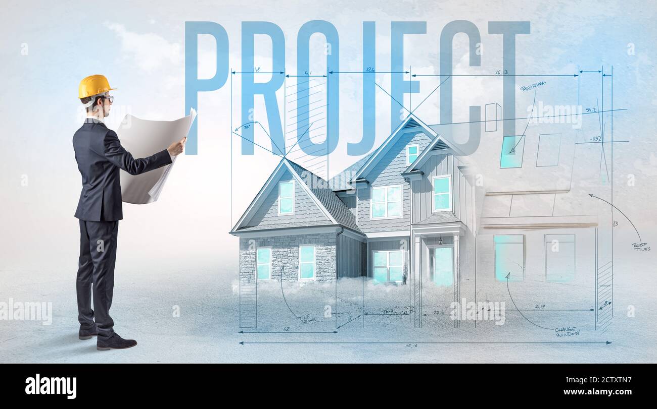 Young engineer holding blueprint with PROJECT inscription, house ...