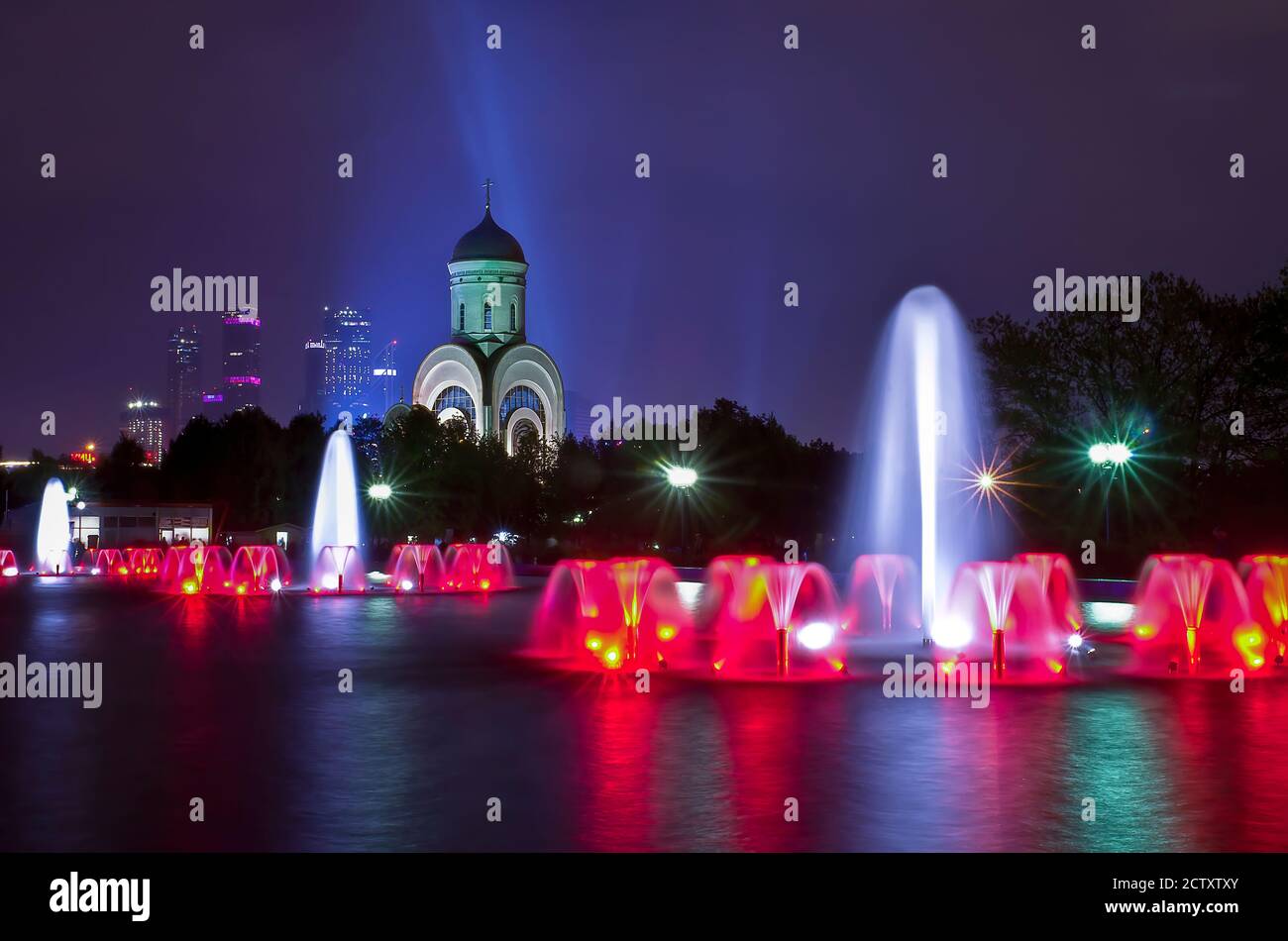 Night view of the victory square with colored fountains Stock Photo - Alamy