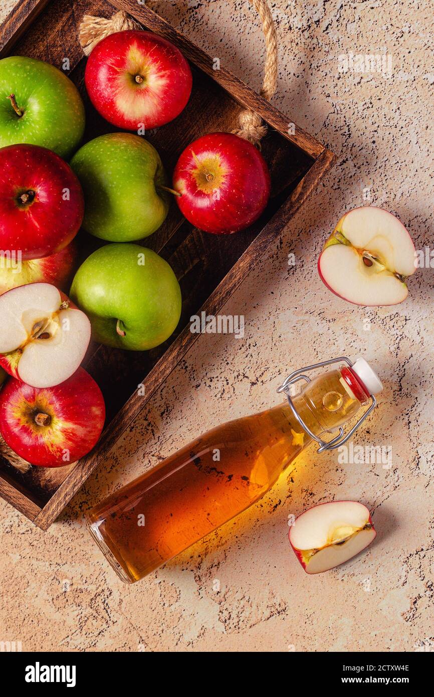 Apple cider vinegar or fermented fruit drink, top view Stock Photo - Alamy