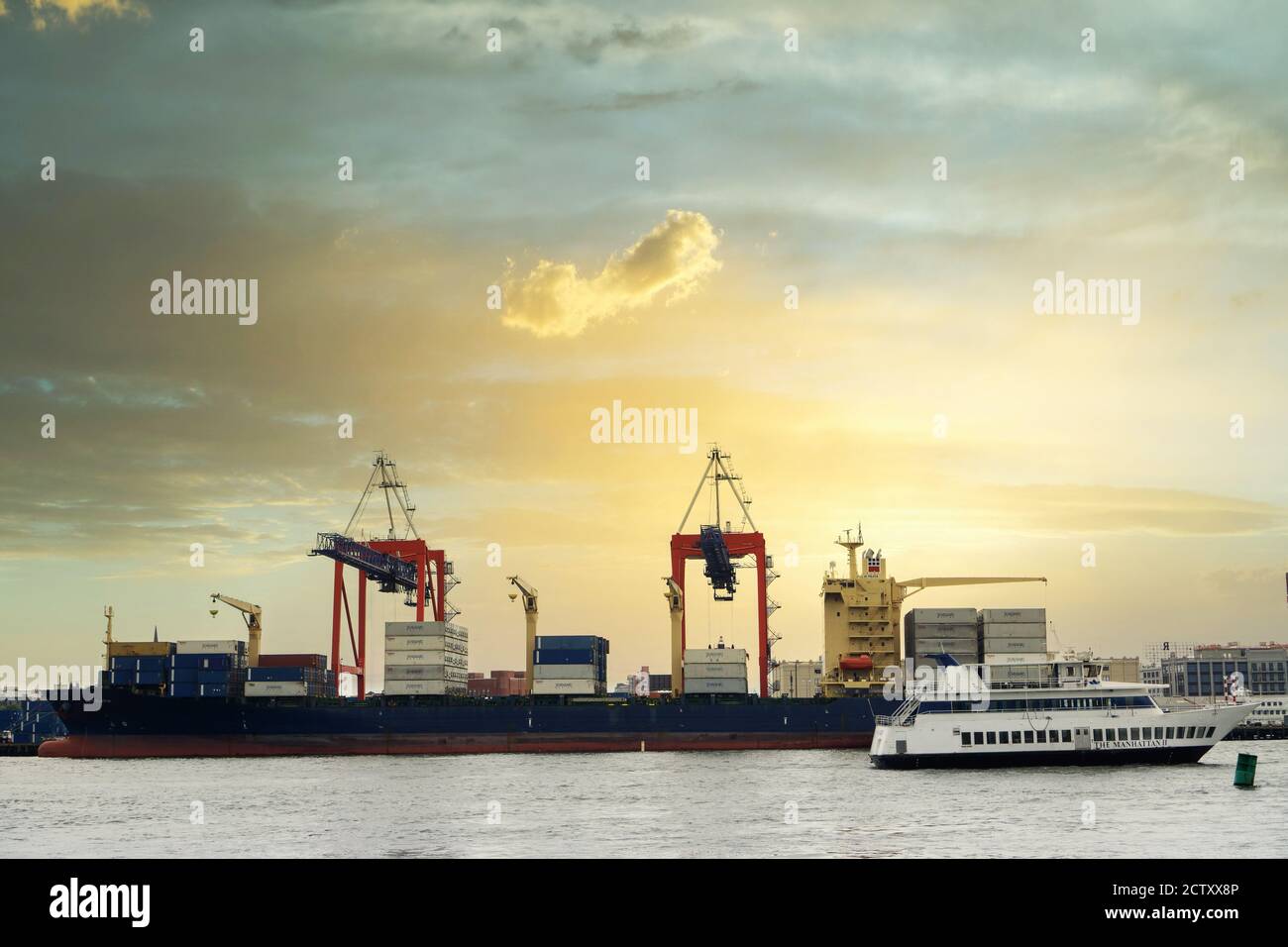 Container ship on New York Upper Bay. Cranes unloading a cargo ship in ...