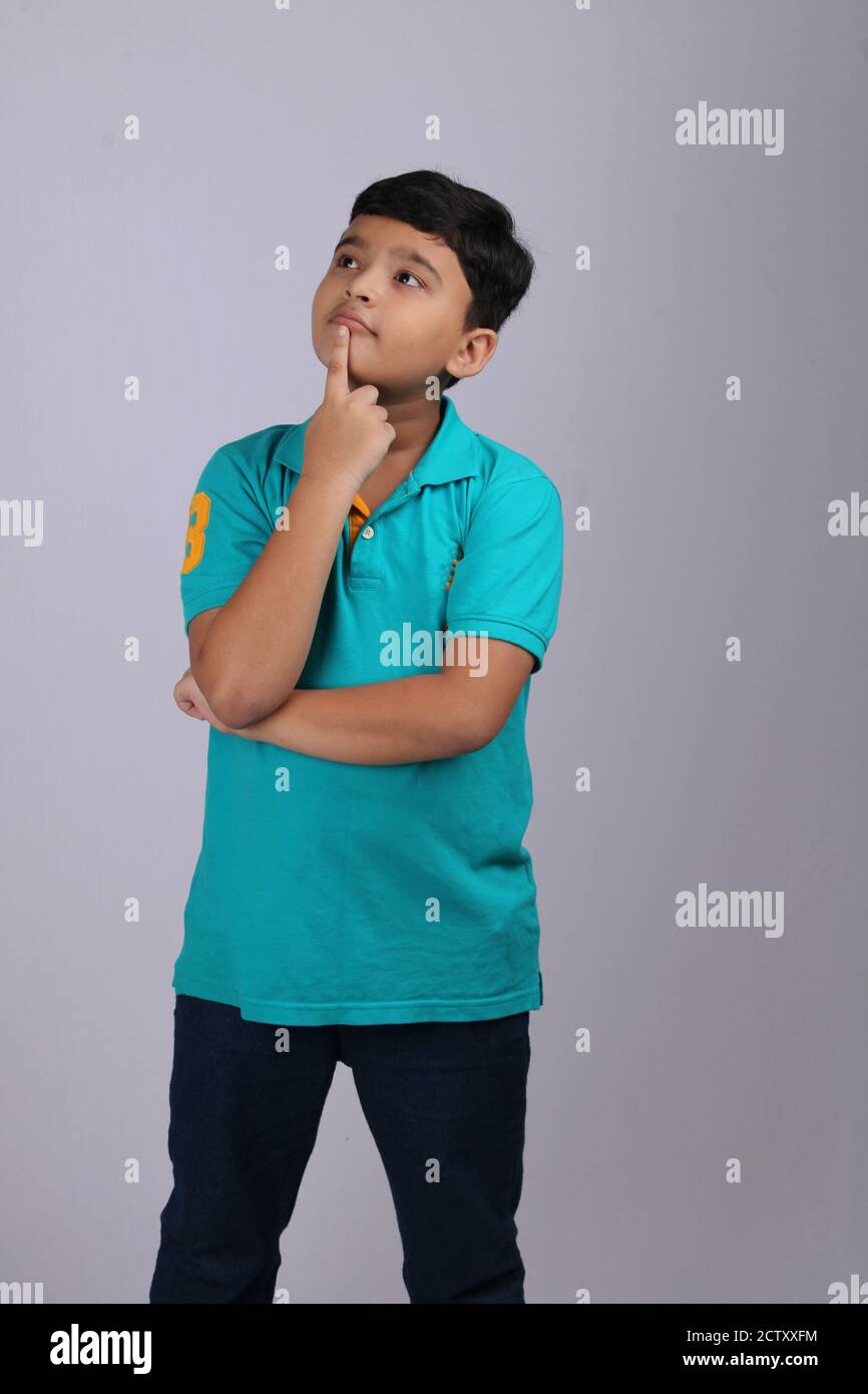 Thinking indian child deep in thought concept for confusion ...