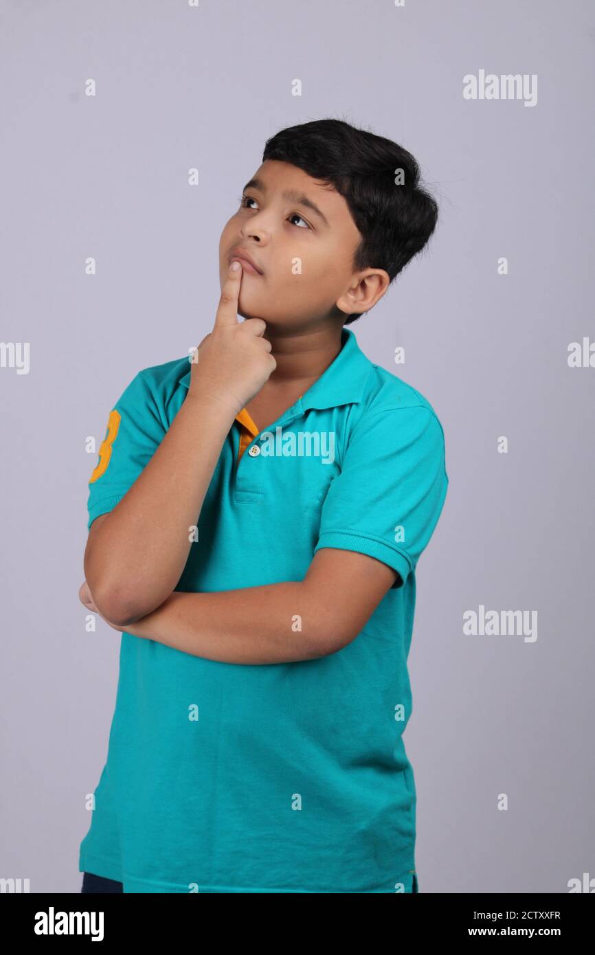 Thinking indian child deep in thought concept for confusion ...